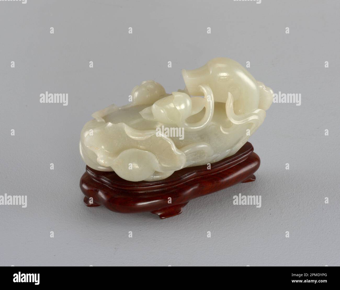 Sculpture On Stand; carved nephrite, carved rosewood Stock Photo - Alamy