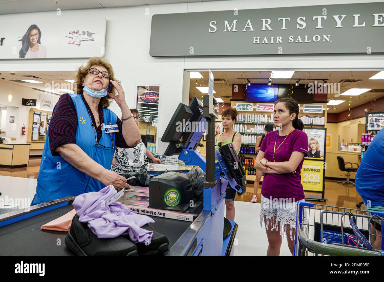 Checkout line queue cashier customers hi-res stock photography and ...