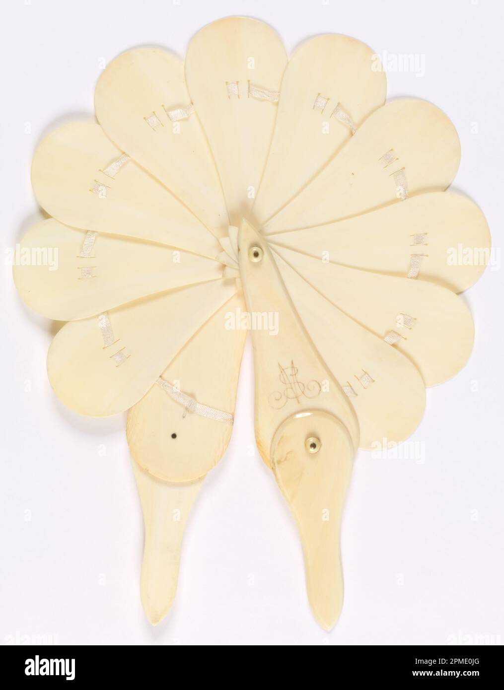 Cockade Fan; carved ivory sticks and handle, silk ribbon Stock Photo ...