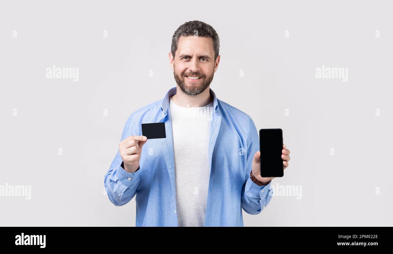 glad man paying transaction in studio. man paying transaction Stock ...