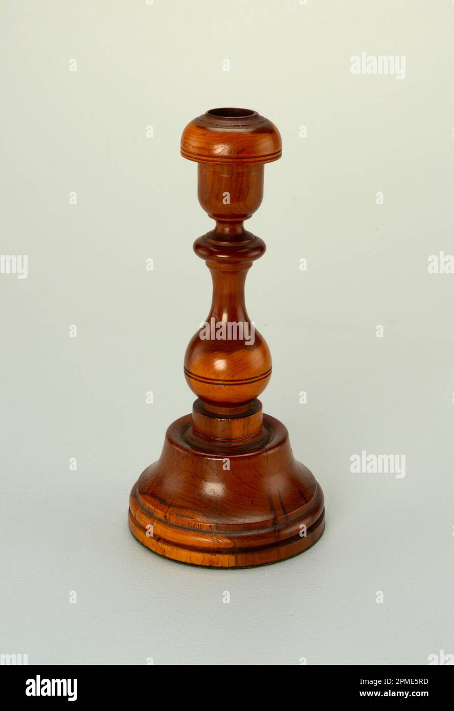 Candlestick (England); lignum vitae or yew, turned Stock Photo - Alamy
