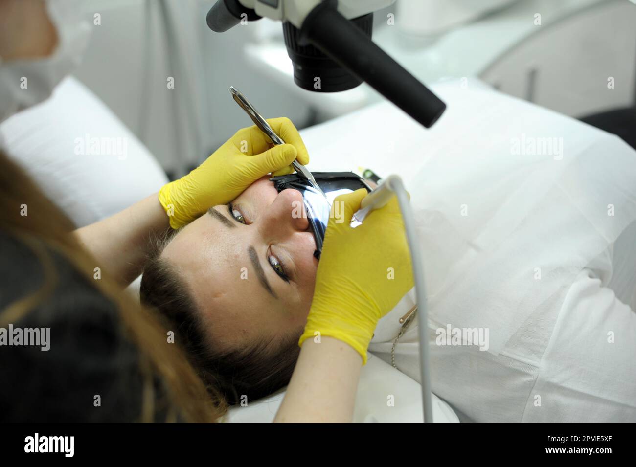 Charming young female person demonstrating her smile while being at ...