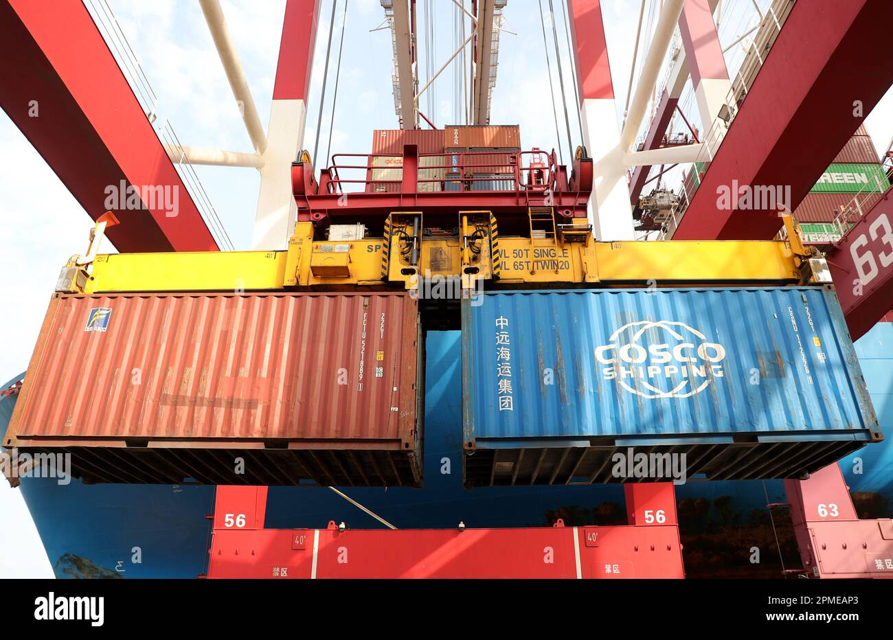 QINGDAO, CHINA - APRIL 13, 2023 - A cargo ship loads cargo at the ...