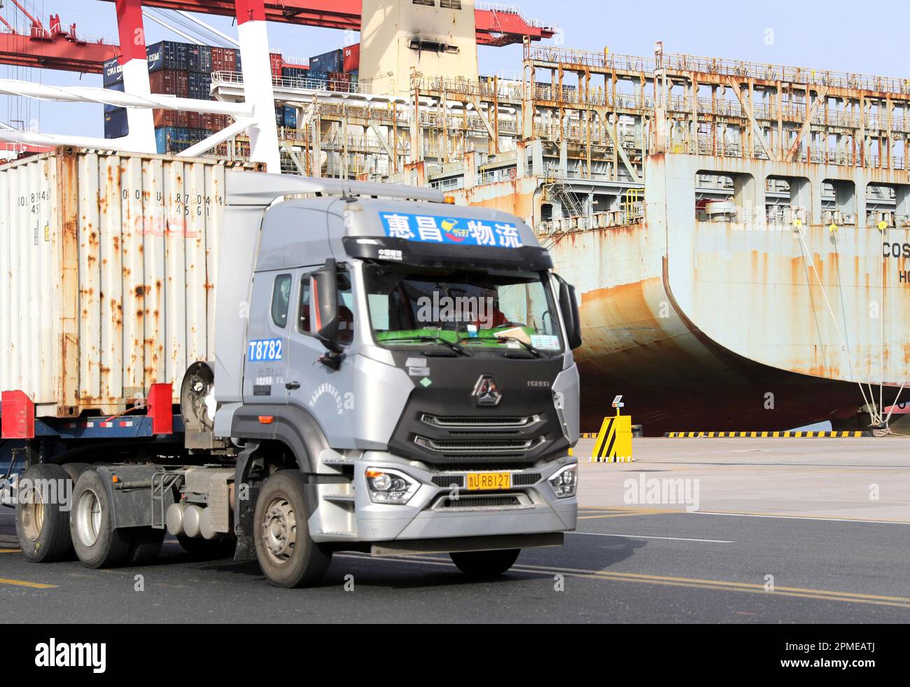 QINGDAO, CHINA - APRIL 13, 2023 - A container truck loads cargo at the ...