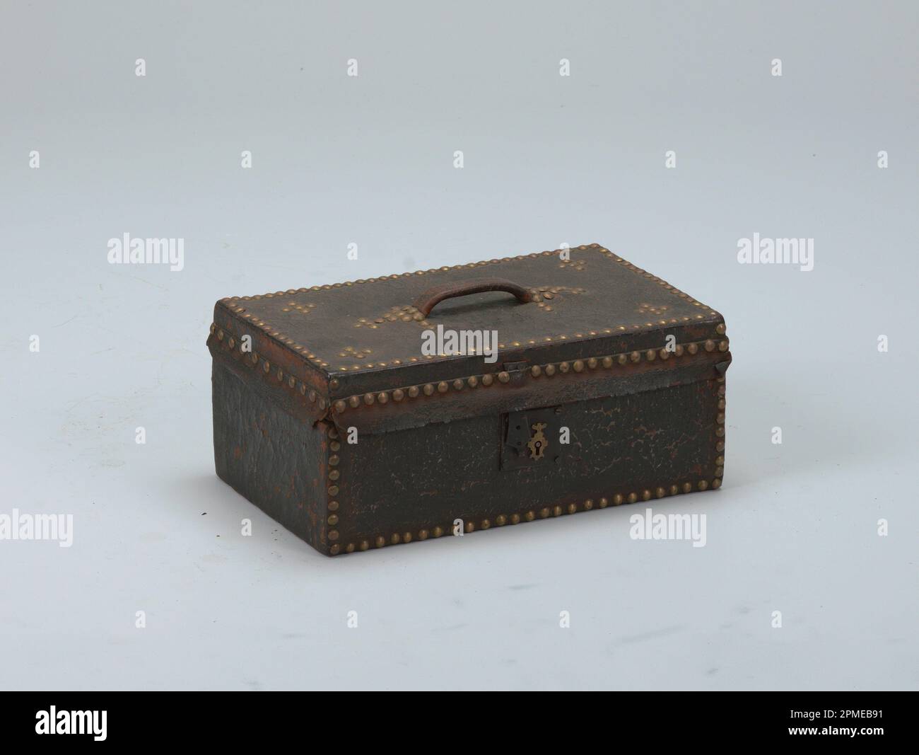 Chest (USA); leather-covered wood, iron lock, brass tacks, fabric ...