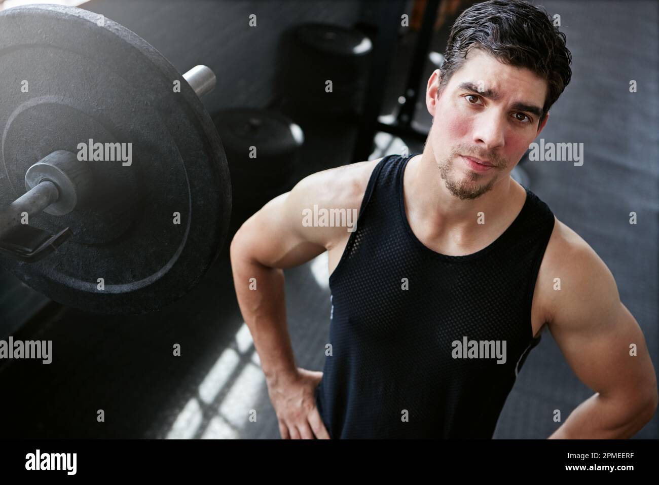 Think you can lift with the big boys. a young man about to work out ...
