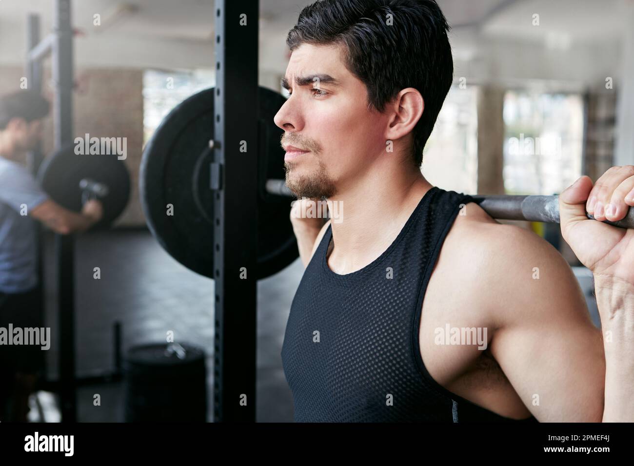 Ready for the lift. a young athlete working out in the gym Stock Photo ...