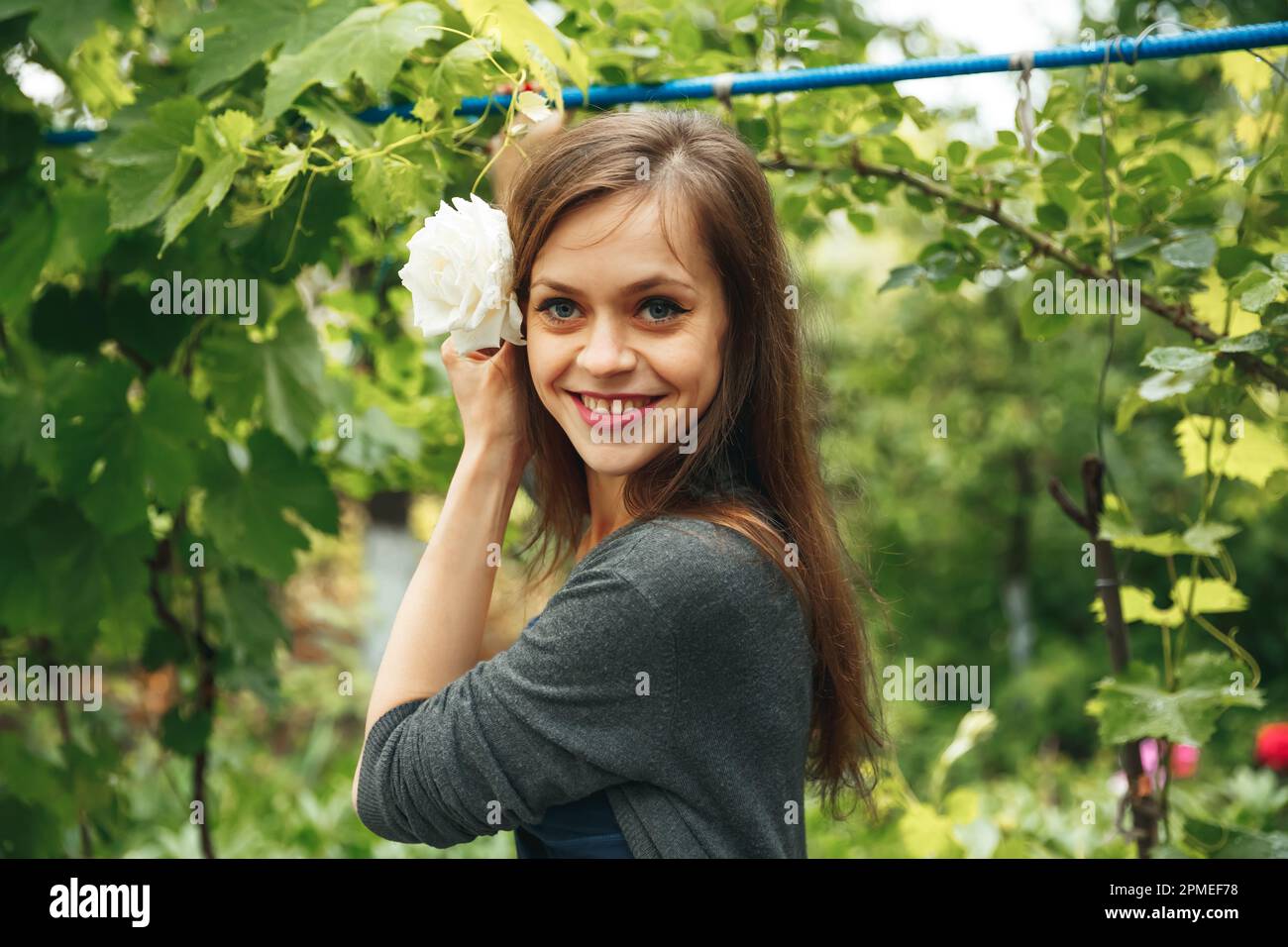 Beautiful girl with white rose. Fashion model girl face portrait Stock ...