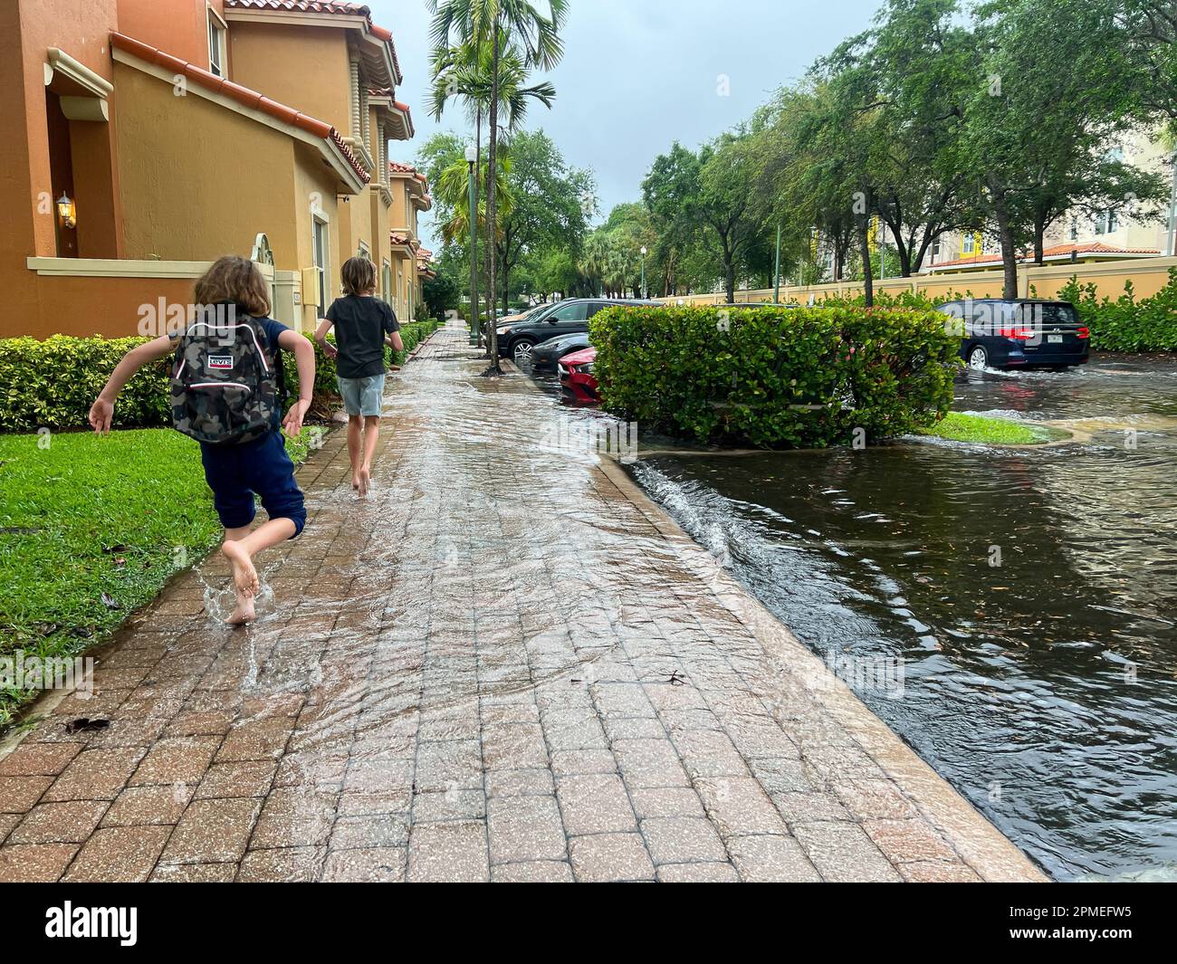 Fort Lauderdale, Florida, USA. 12th Apr, 2023. Children run home after ...