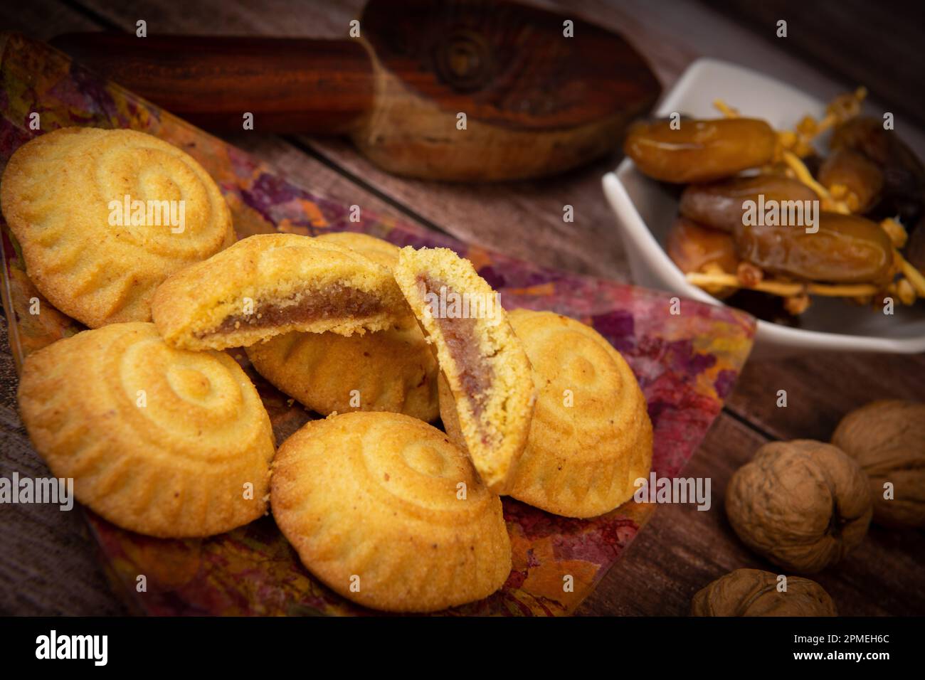 Traditional eid maamoul or mamoul cookies with dates, nuts, and jam ...