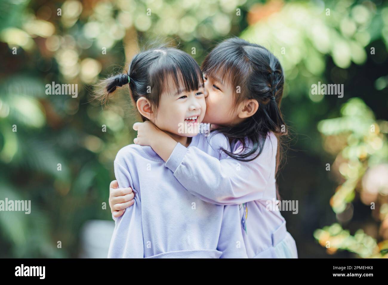 Portrait of emotional face expression of smiling and laughing of Asian ...