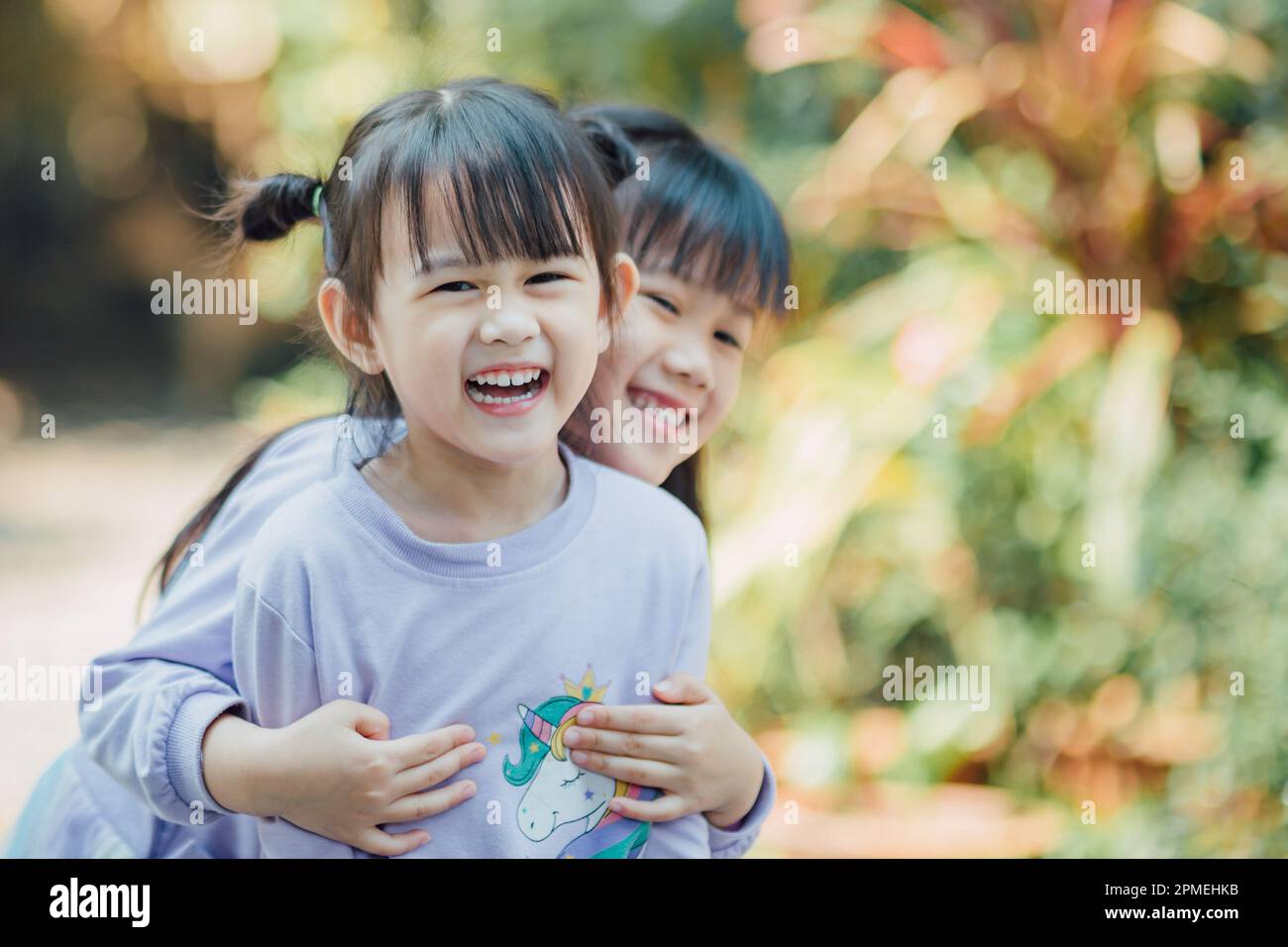 Portrait of emotional face expression of smiling and laughing of Asian ...