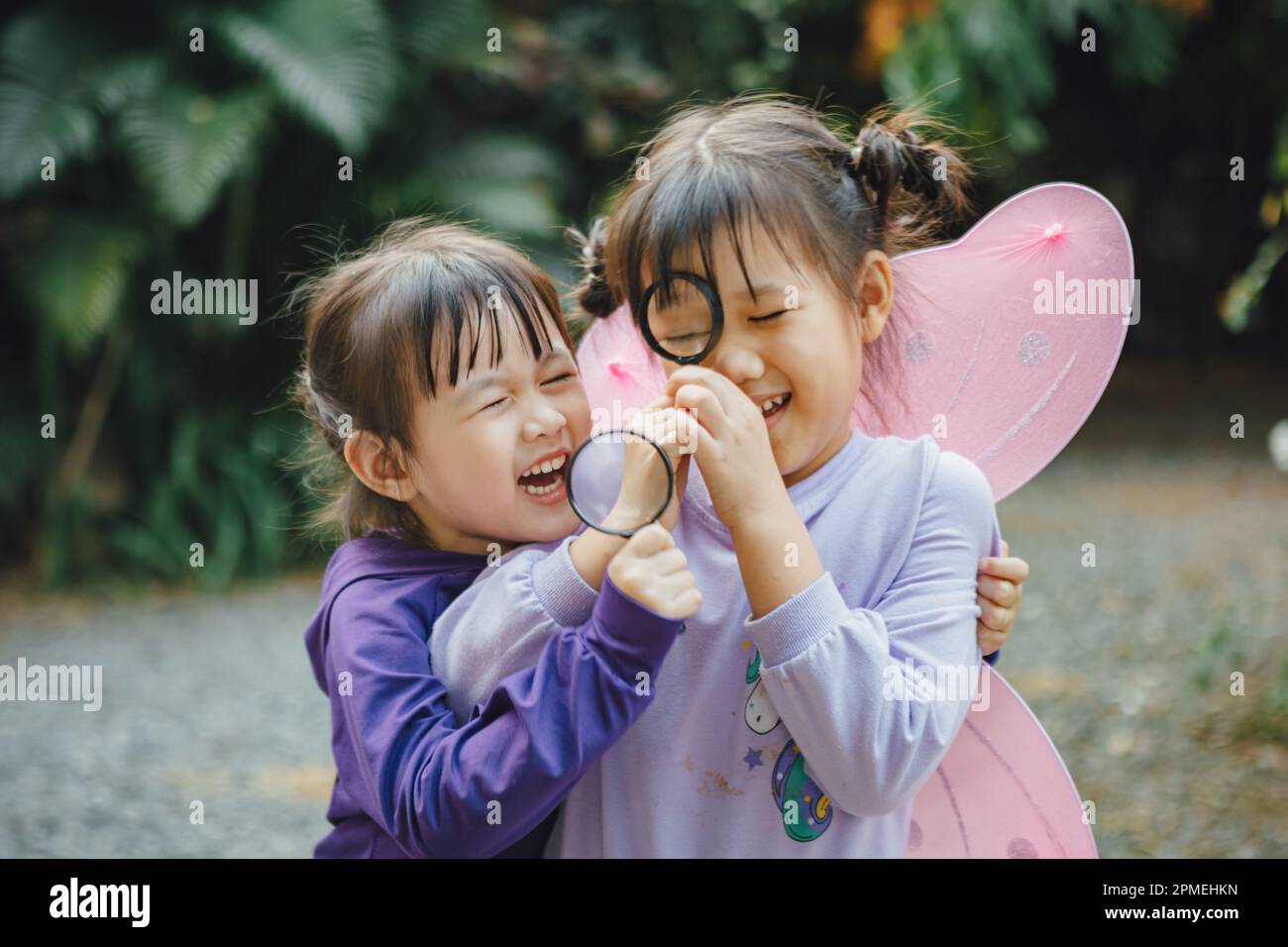 Portrait of emotional face expression of smiling and laughing of Asian ...