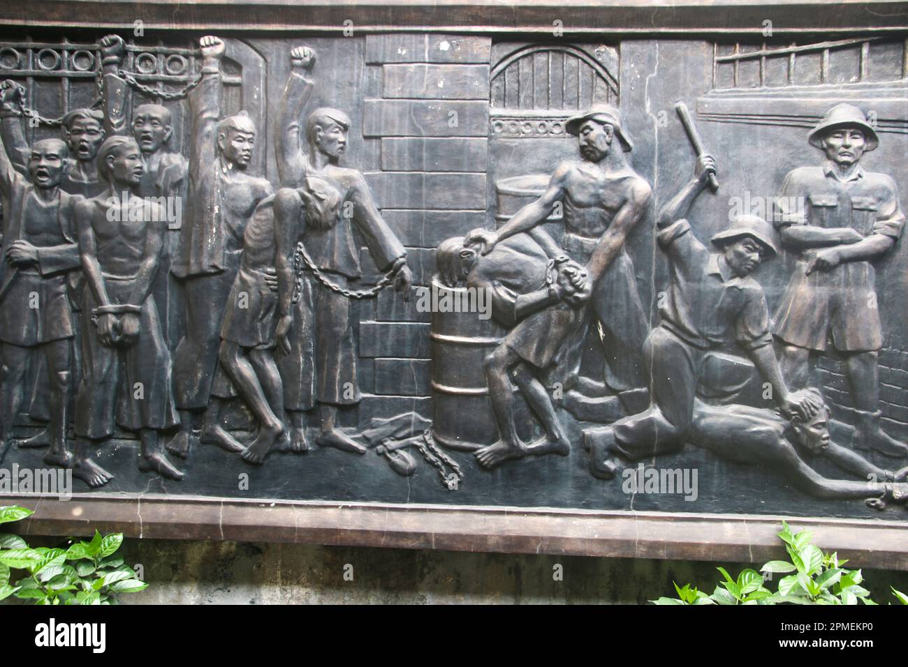 Vietnam: Bas-relief showing torture and brutality by the French ...