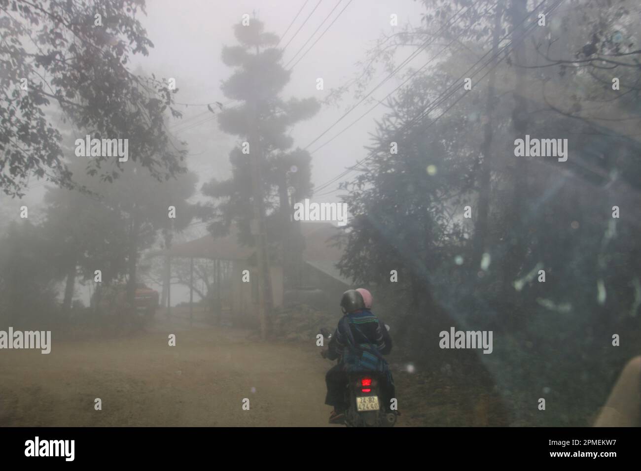 traffic on a misty Rural road Photographed near Sa Pa Northwestern ...