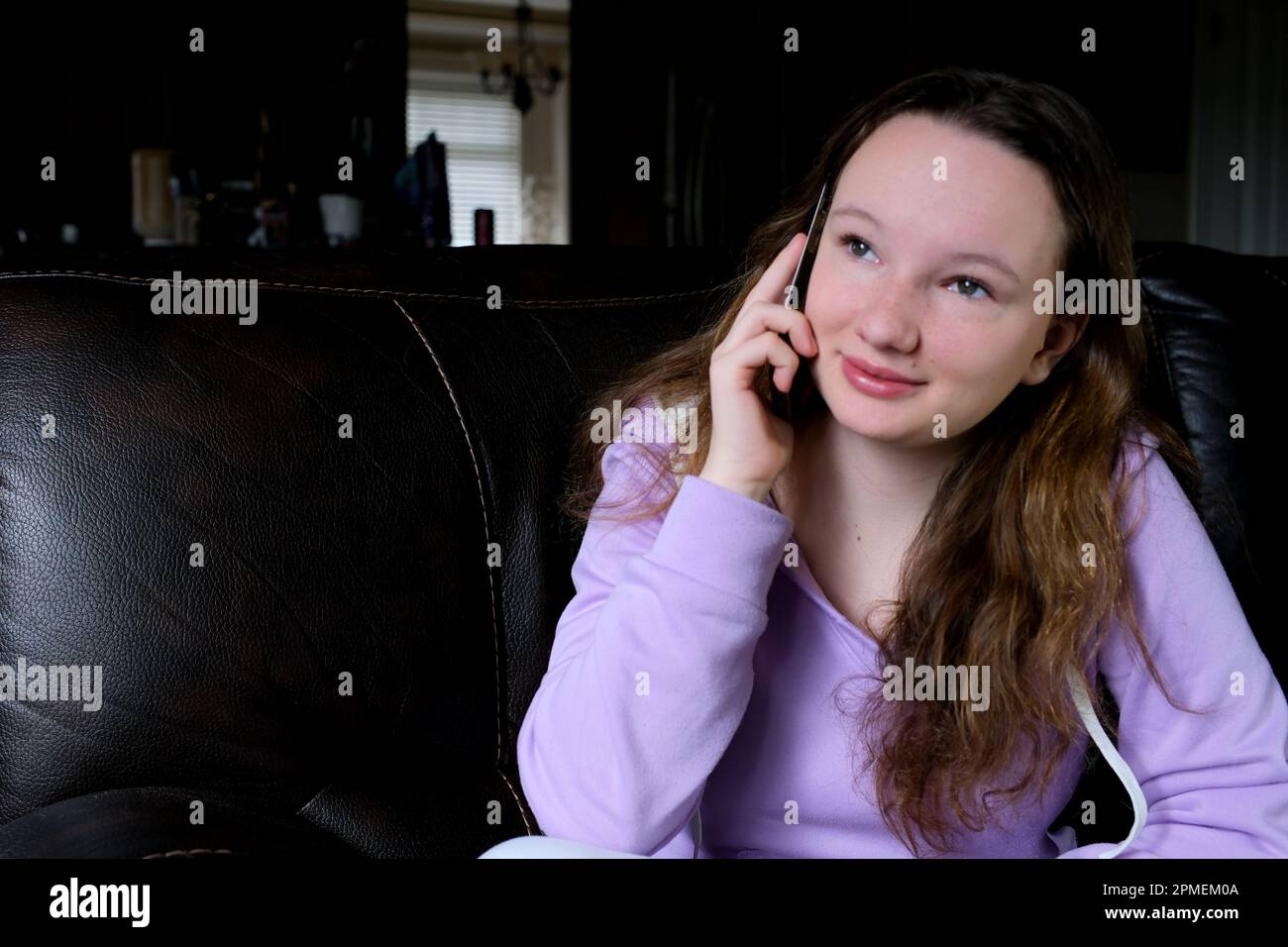 Happy hispanic teen girl waving hand using smartphone app enjoying ...
