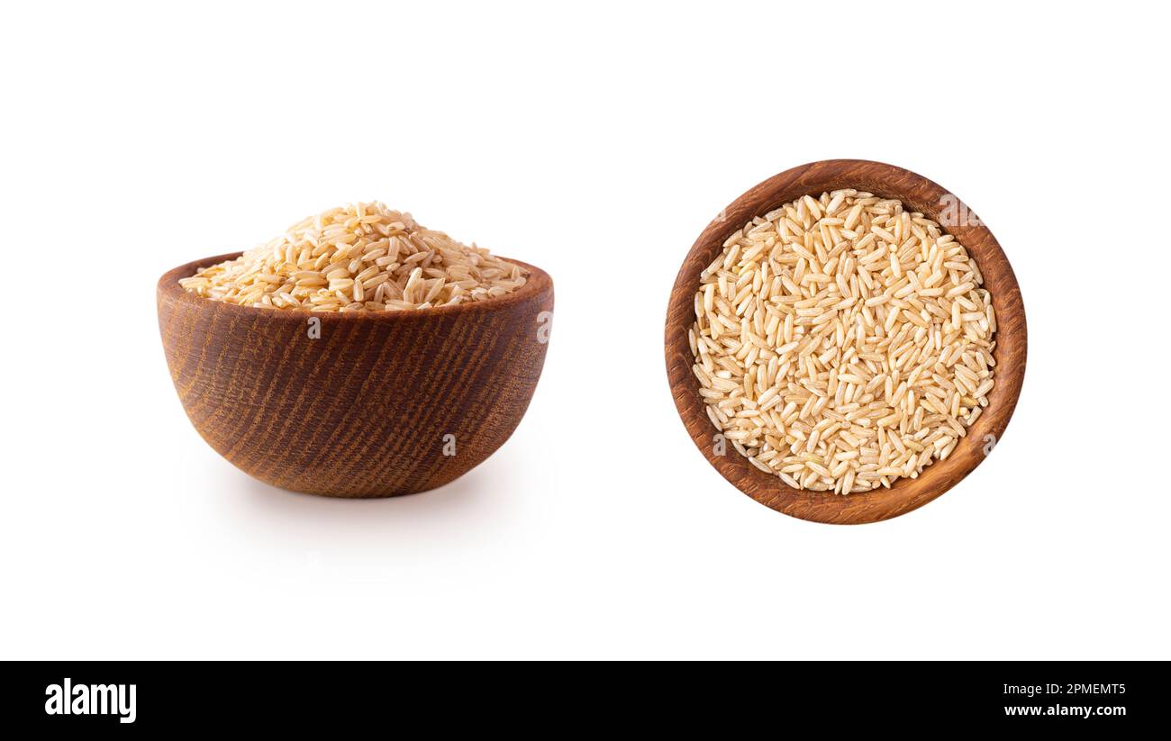 Bowl with brown rice isolated on white background. Close-up. Grain rice ...