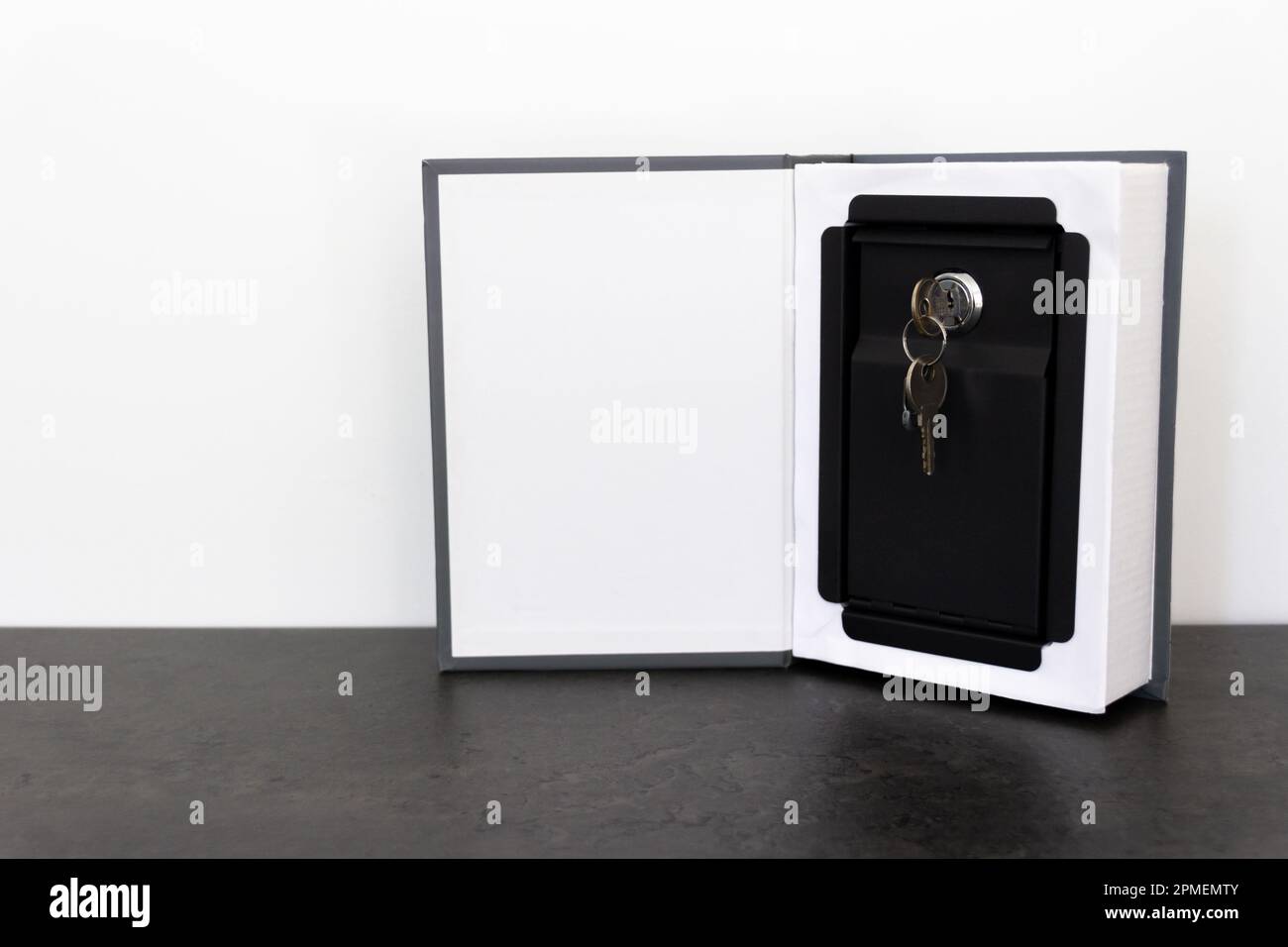 A clever book safe with keys in the lock is a discreet place to stash ...