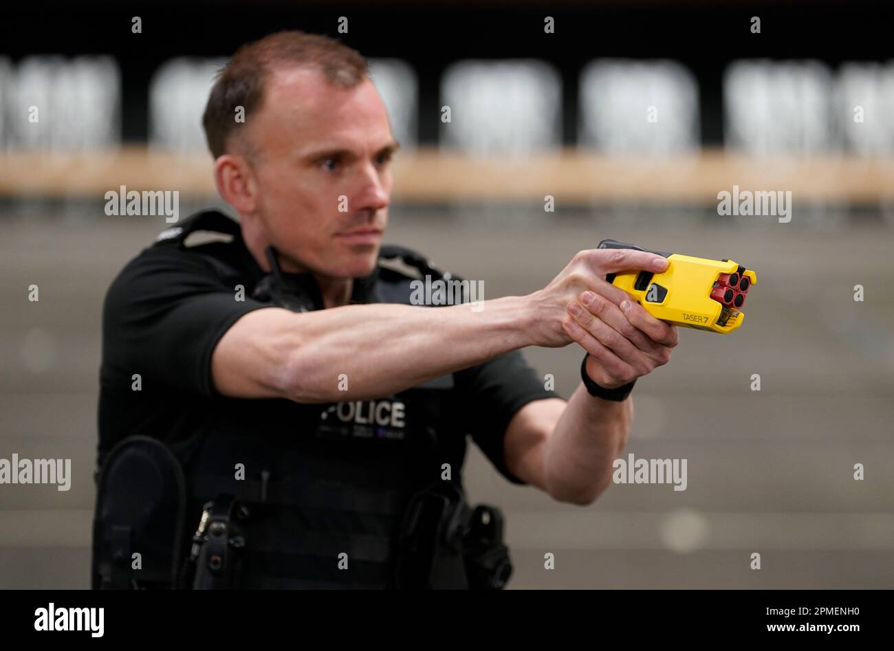 An officer holds the new Taser 7 during a demonstration as Hampshire ...