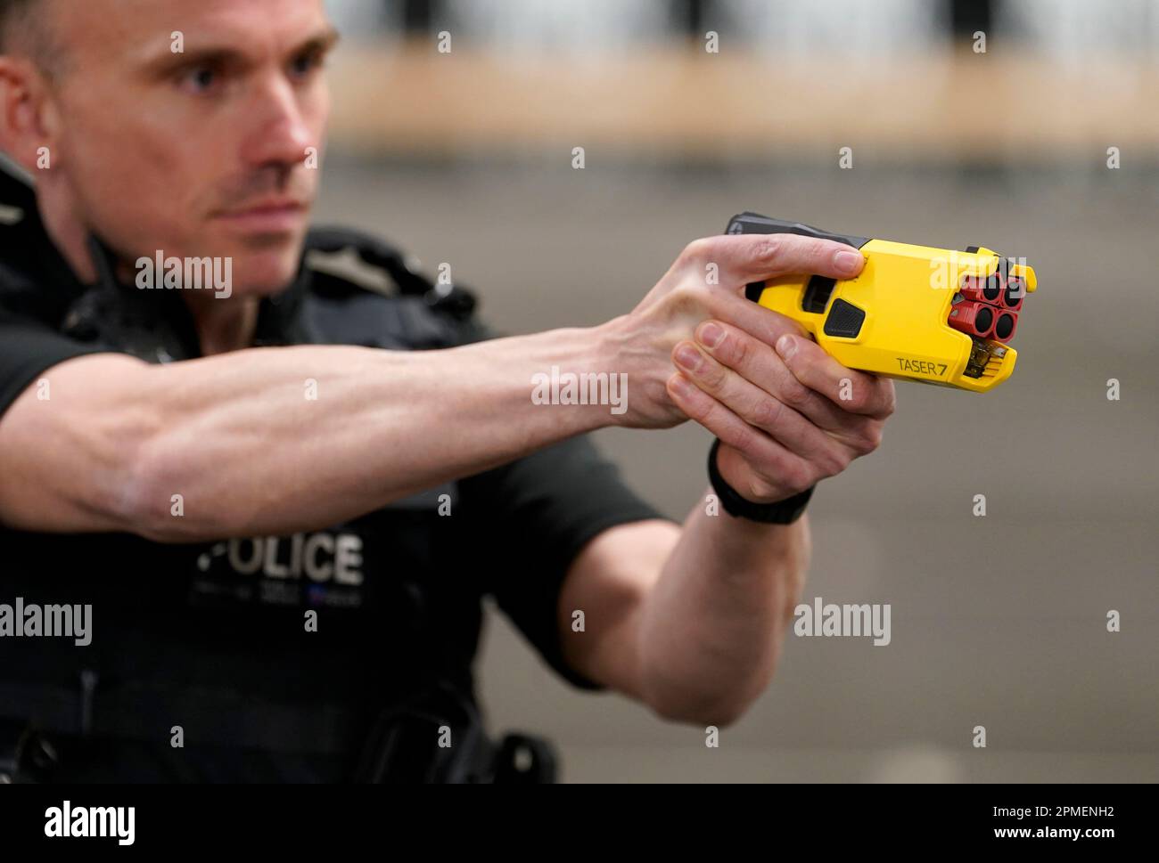 An officer holds the new Taser 7 during a demonstration as Hampshire ...