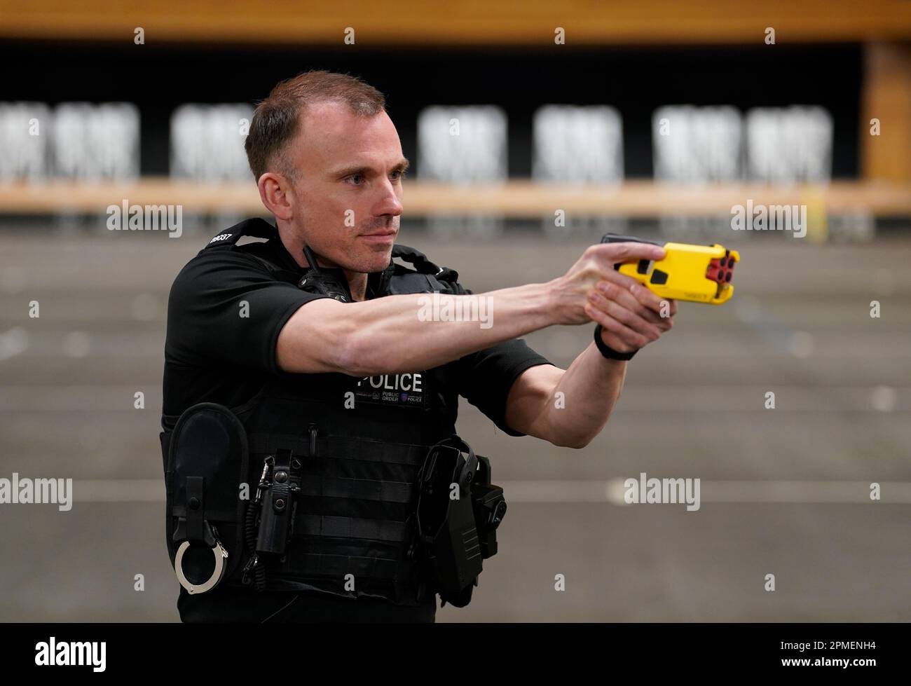 An Officer Holds The New Taser 7 During A Demonstration As Hampshire