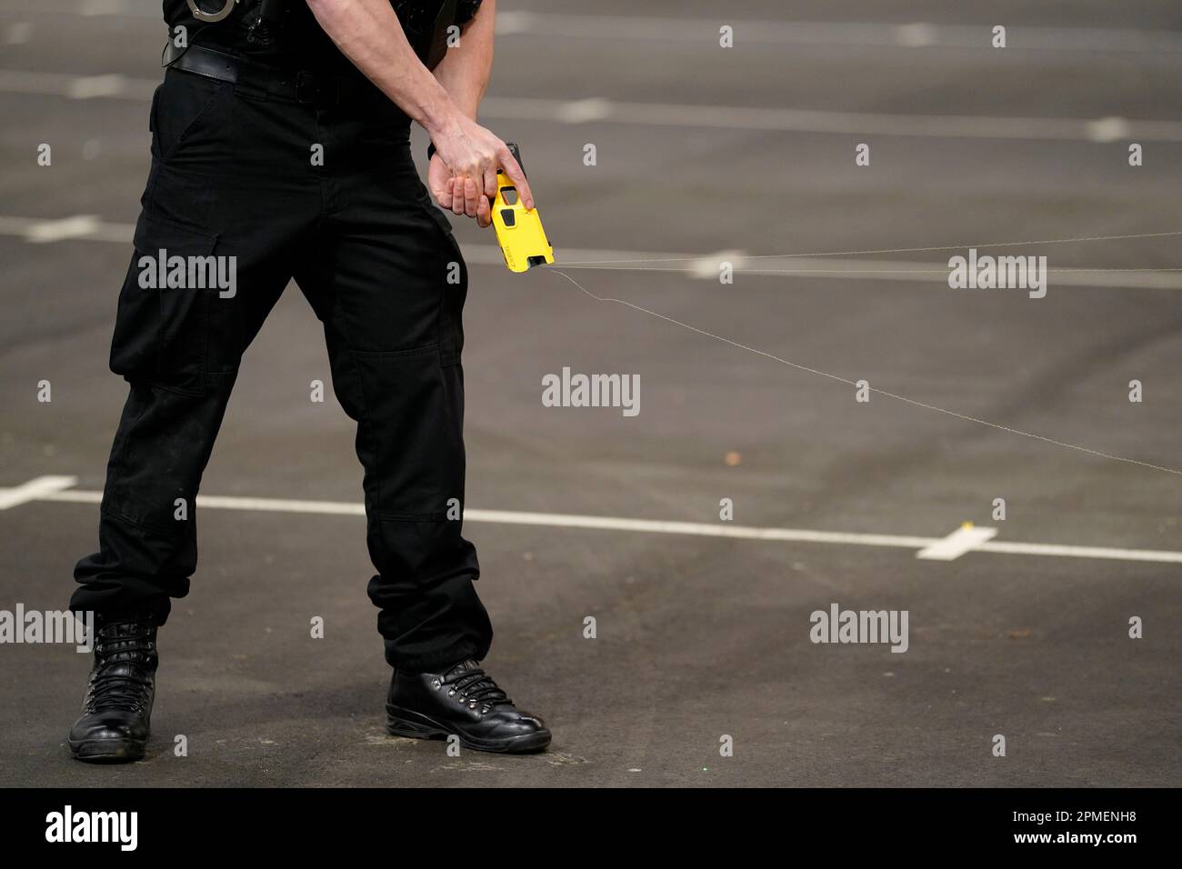 An officer demonstrates the new Taser 7 as Hampshire and Isle of Wight ...