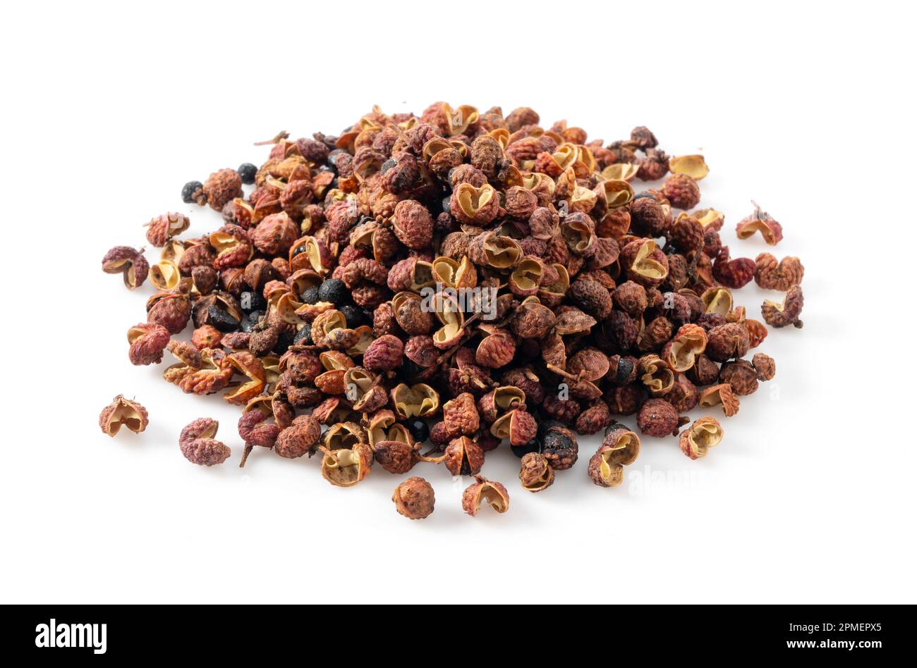 Sichuan pepper placed on a white background. Sichuan pepper is a member ...