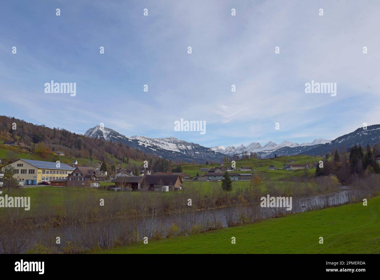 A view of Krummenau village and snow on the mountains in the St Gallen ...