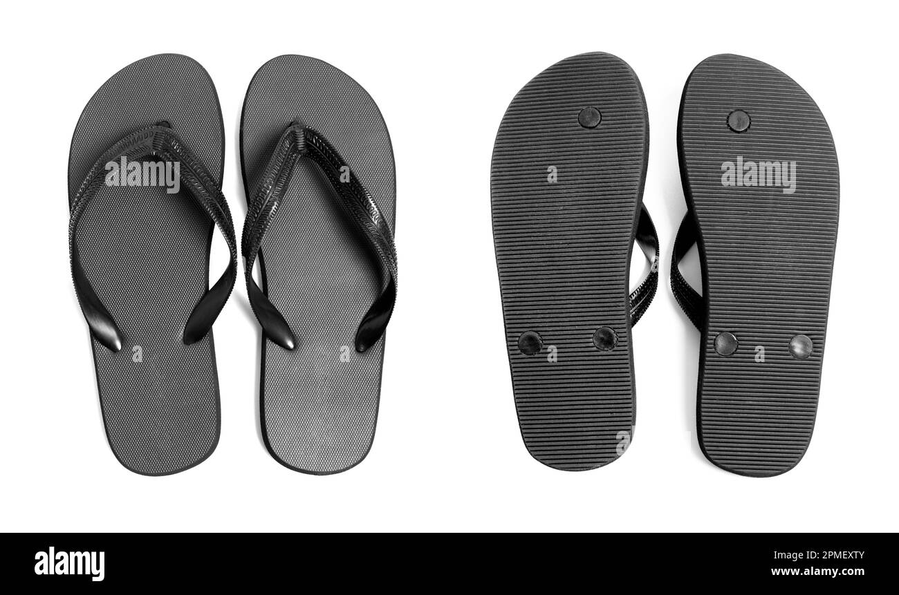 Pair of black flip-flops isolated on a white background, front and back ...