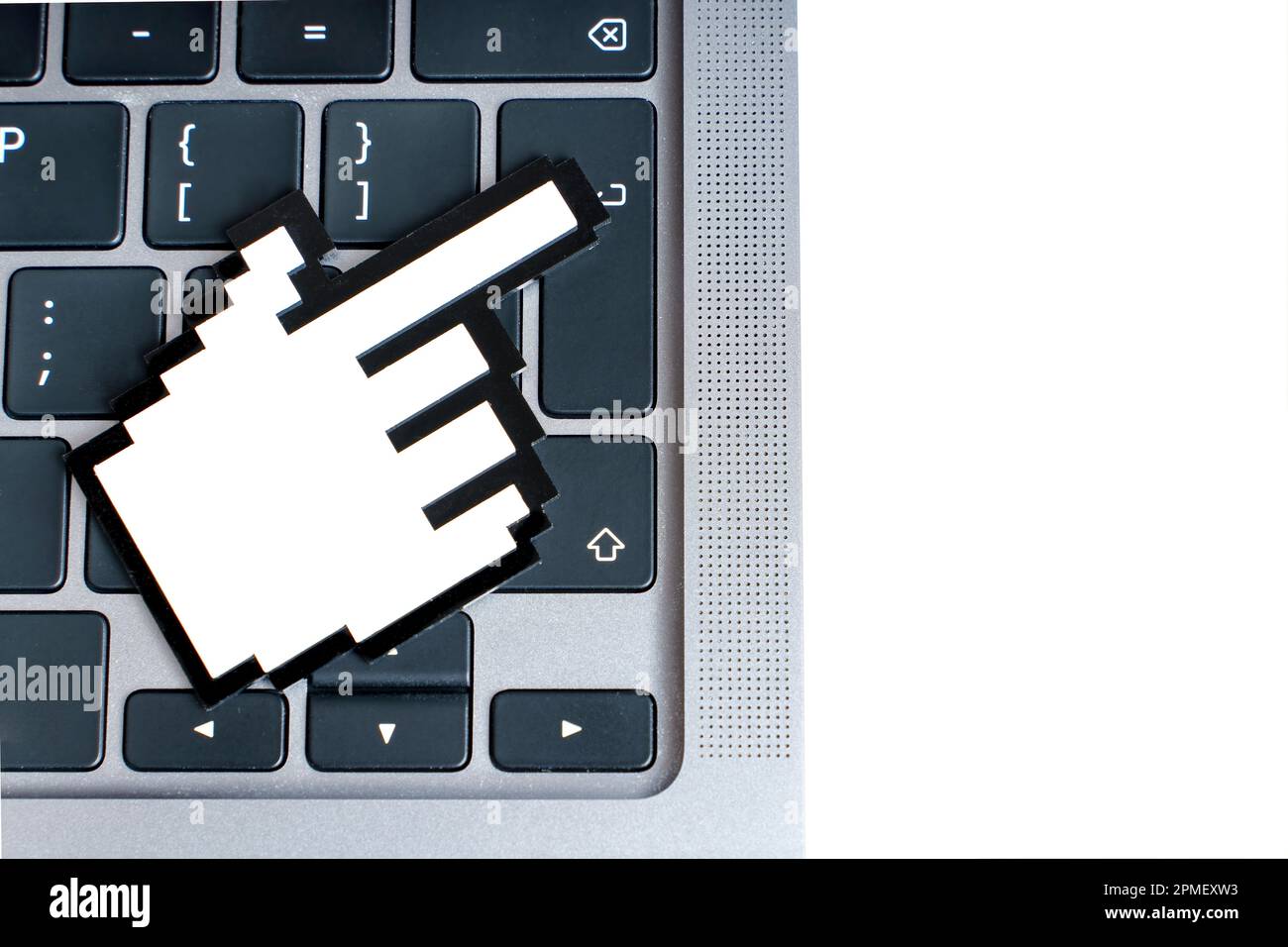 Blocky plastic pixel cursor model clicks enter key on the modern laptop ...