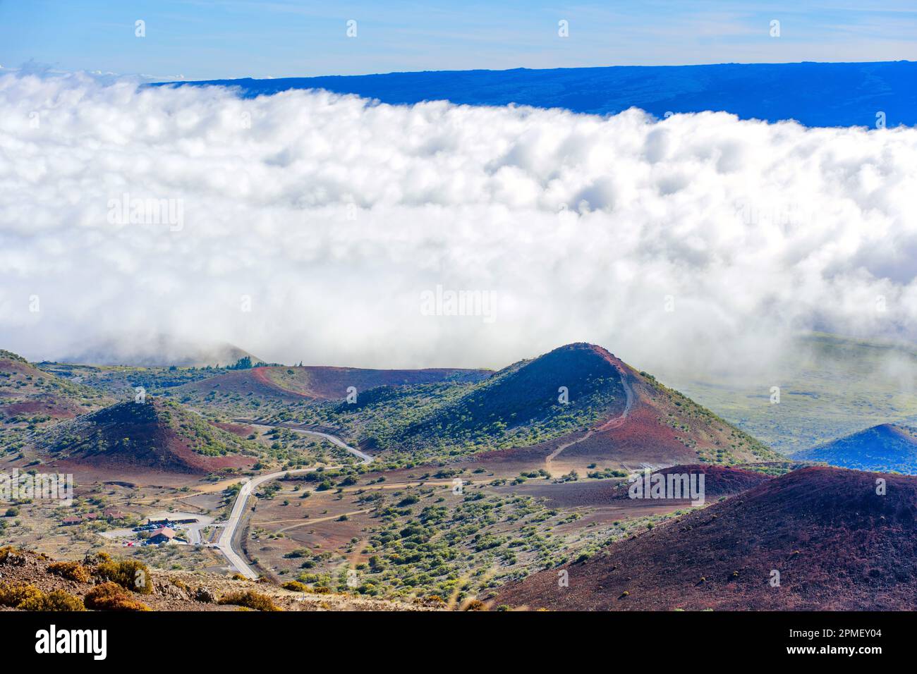Aerial view of Mauna Kea's volcanic landscape representing a mix of ...