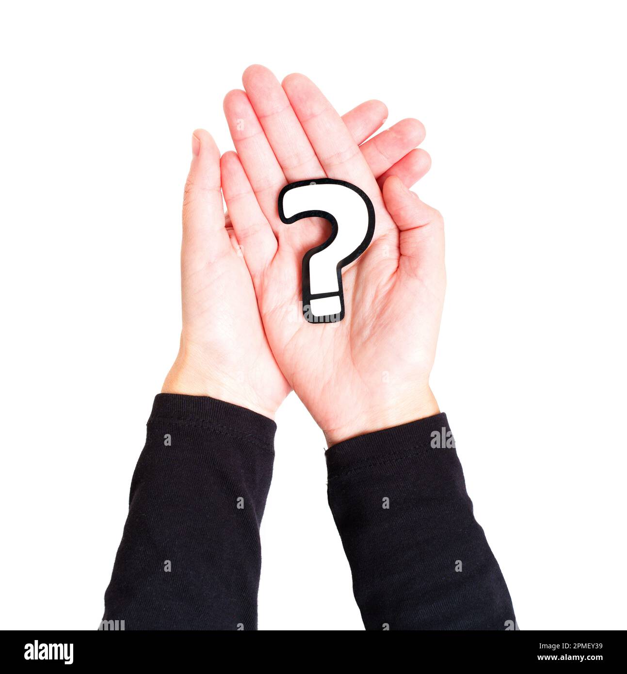 Top view of crossed hands holding a large question mark isolated on ...
