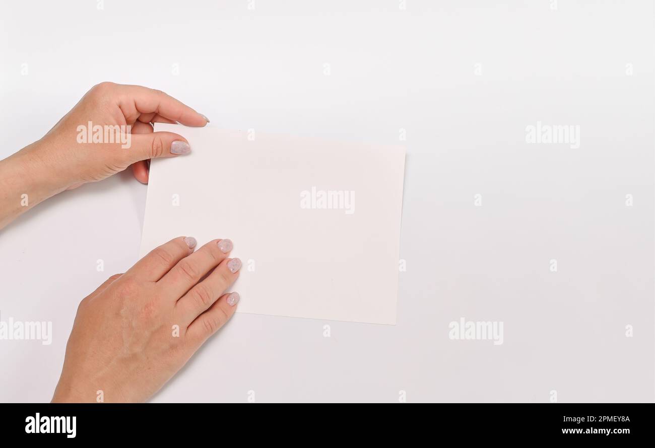 Hands gripping a sheet hi-res stock photography and images - Alamy