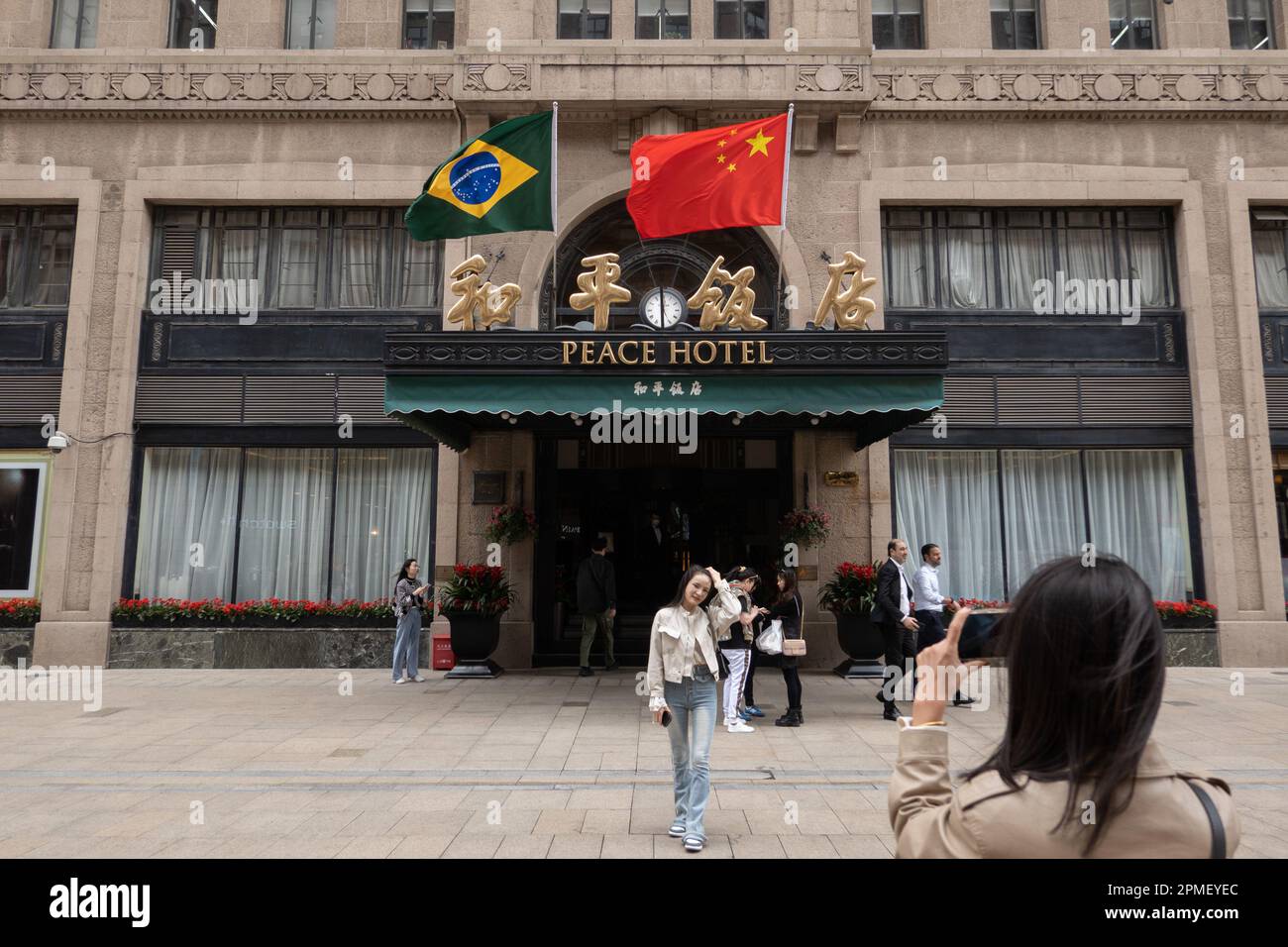 SHANGHAI, CHINA - APRIL 13, 2023 - Chinese and Brazilian national flags ...