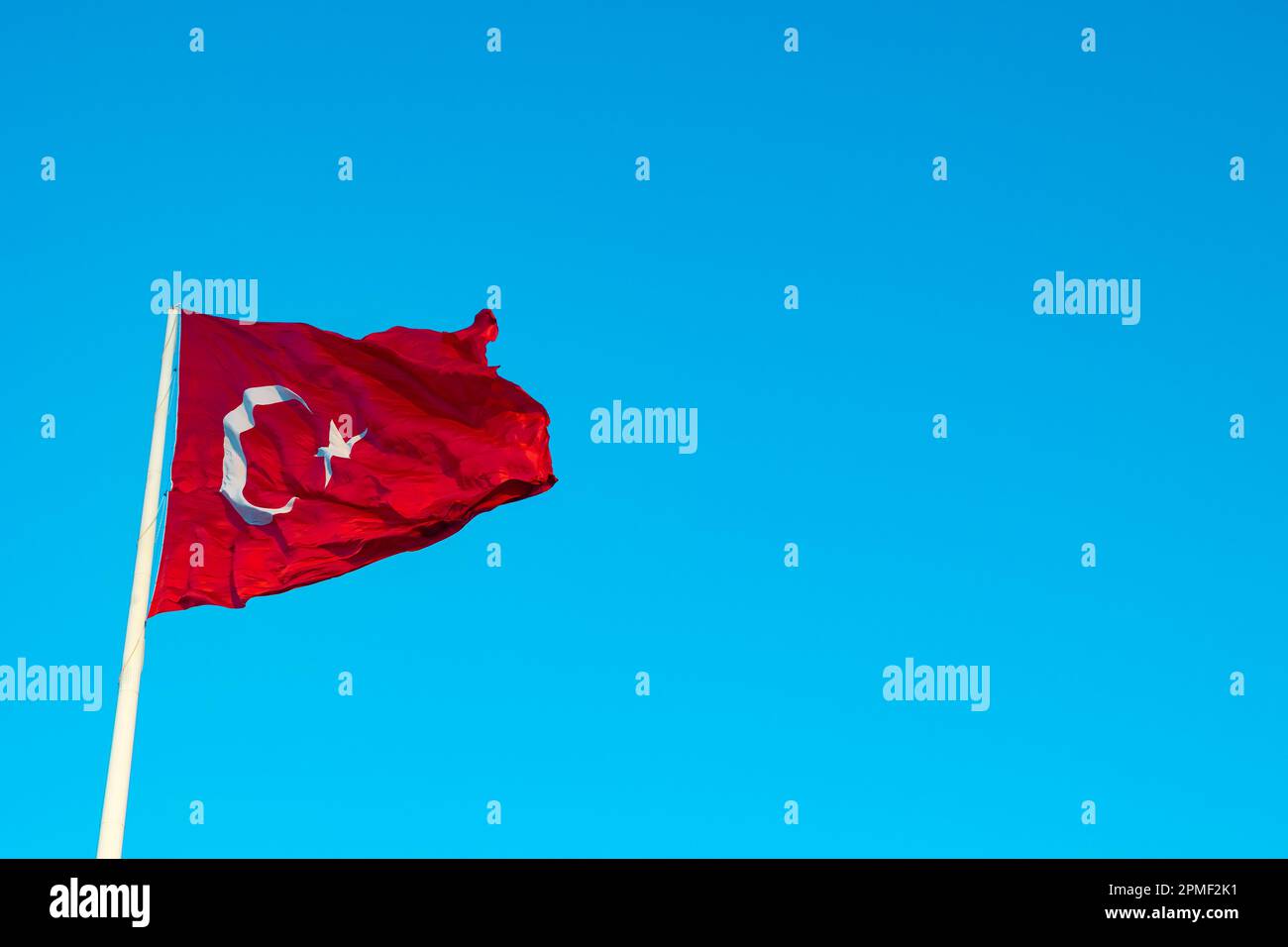 Turkish Flag isolated on blue sky background with copy space for text ...