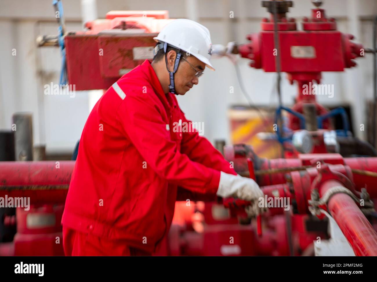 TAIZHOU, CHINA - APRIL 13, 2023 - Drillers work at a shale oil well ...