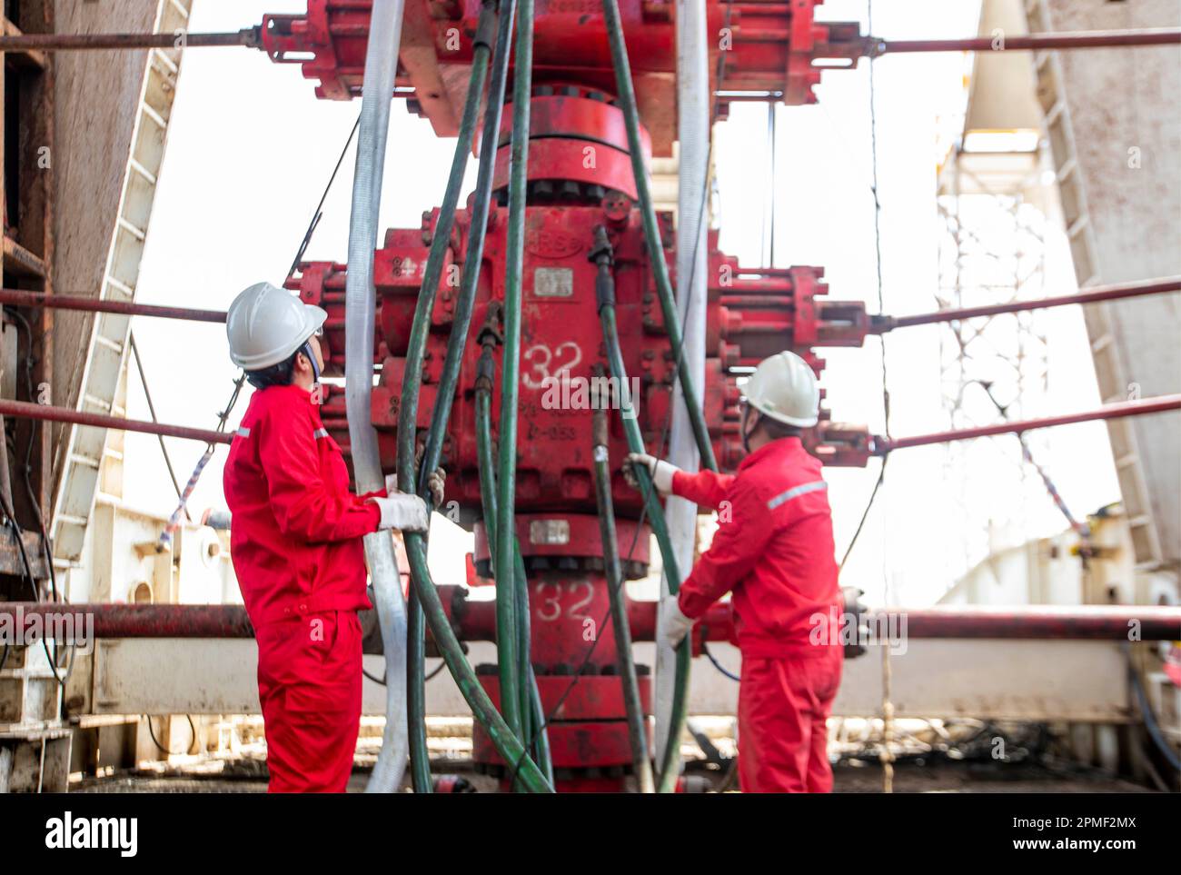 TAIZHOU, CHINA - APRIL 13, 2023 - Drillers work at a shale oil well ...