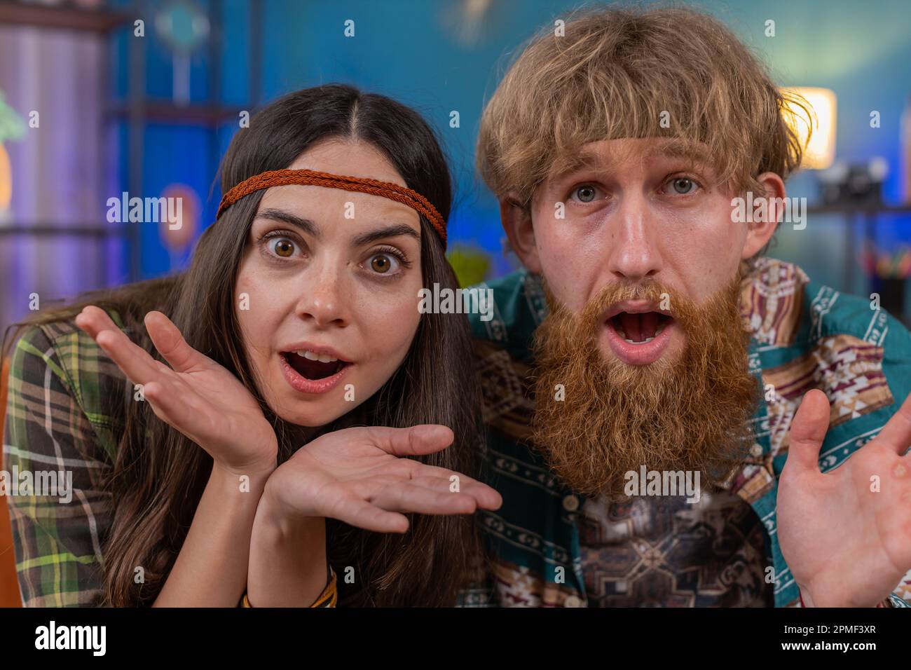 Oh my God, Wow. Hippie family marriage couple man woman surprised ...