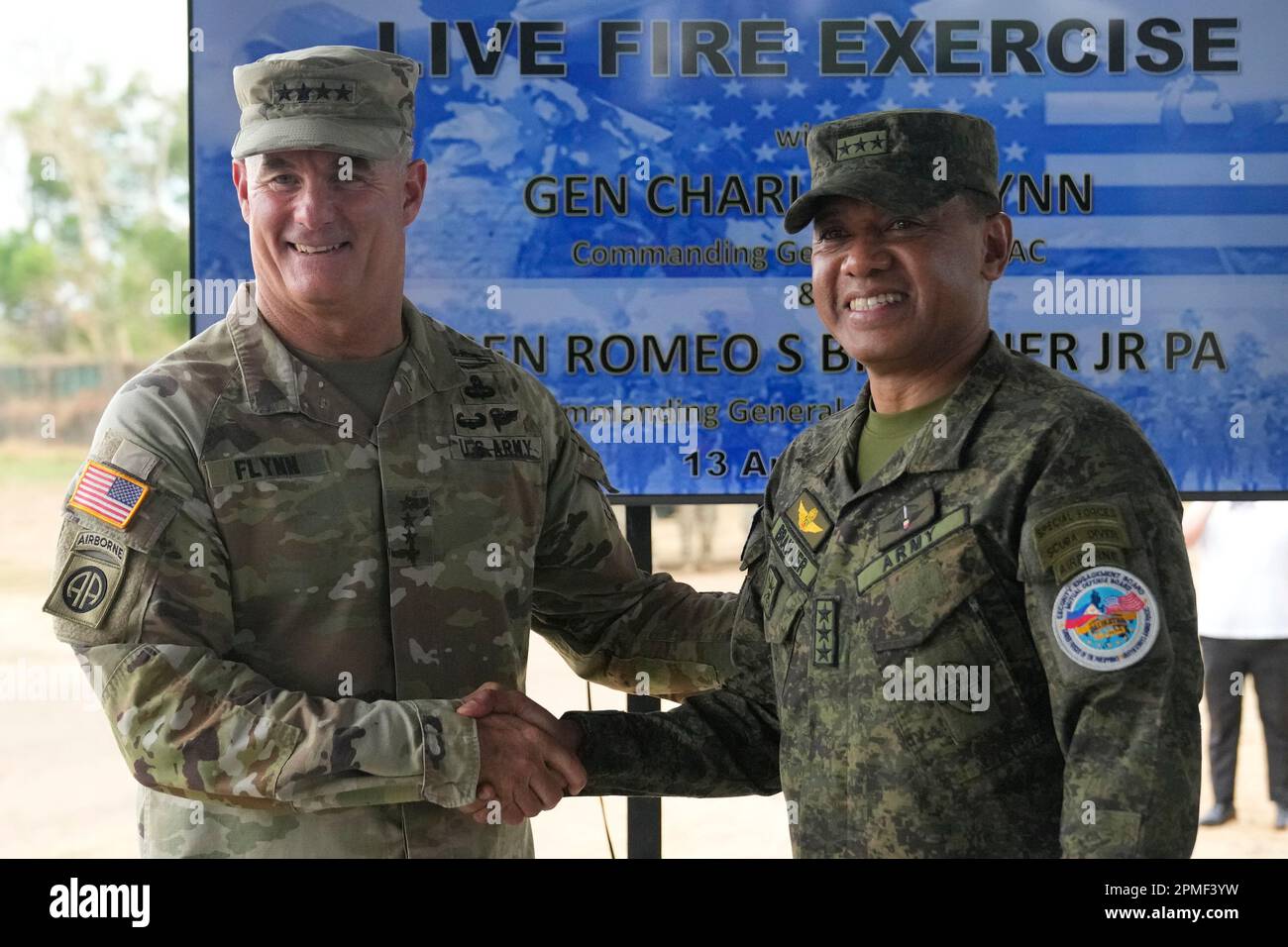 U.S. Gen. Charles Flynn, left, Commanding General USARPAC, shakes hands ...