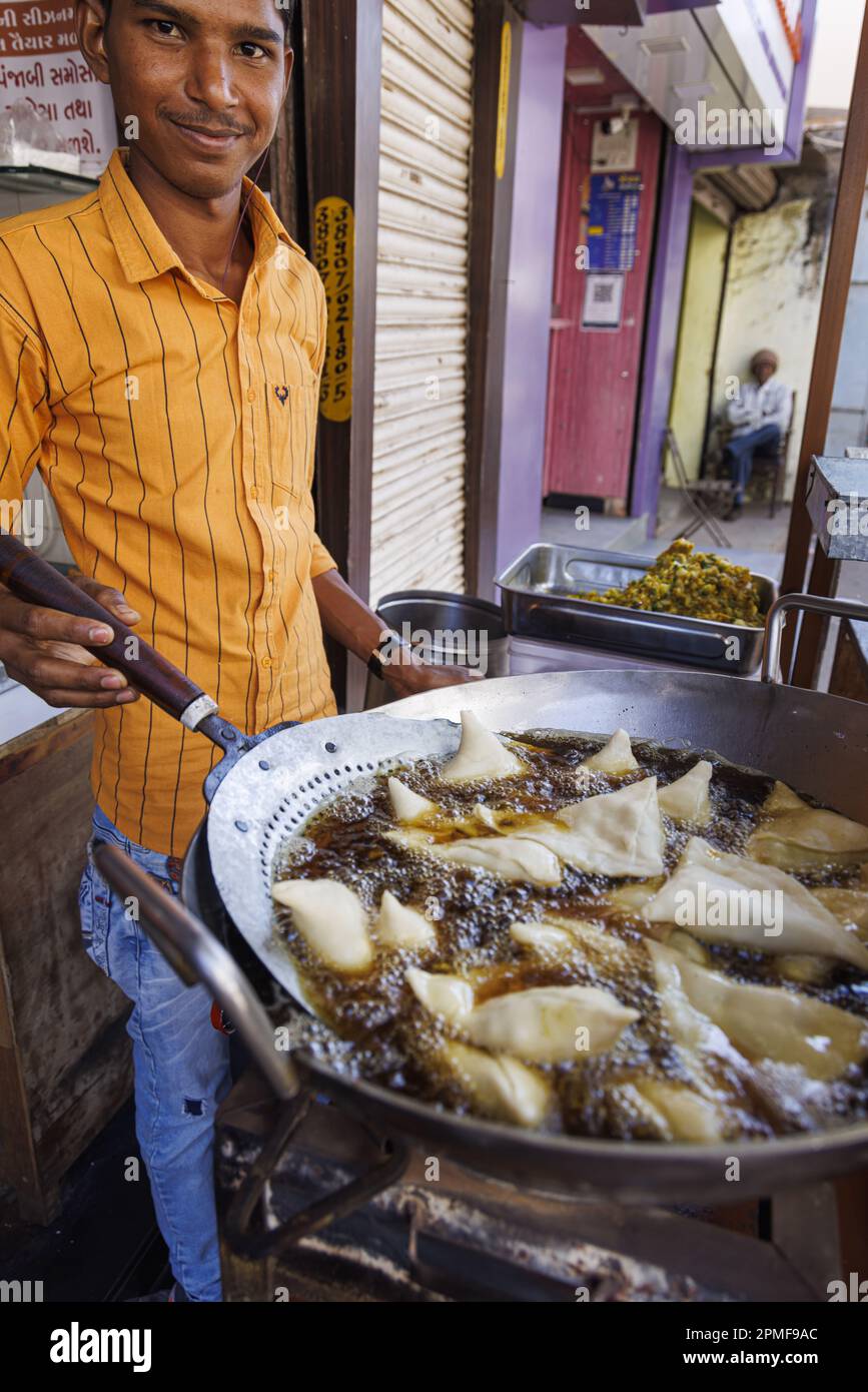 India, Gujarat, Bhuj, man cooking samosas Stock Photo - Alamy