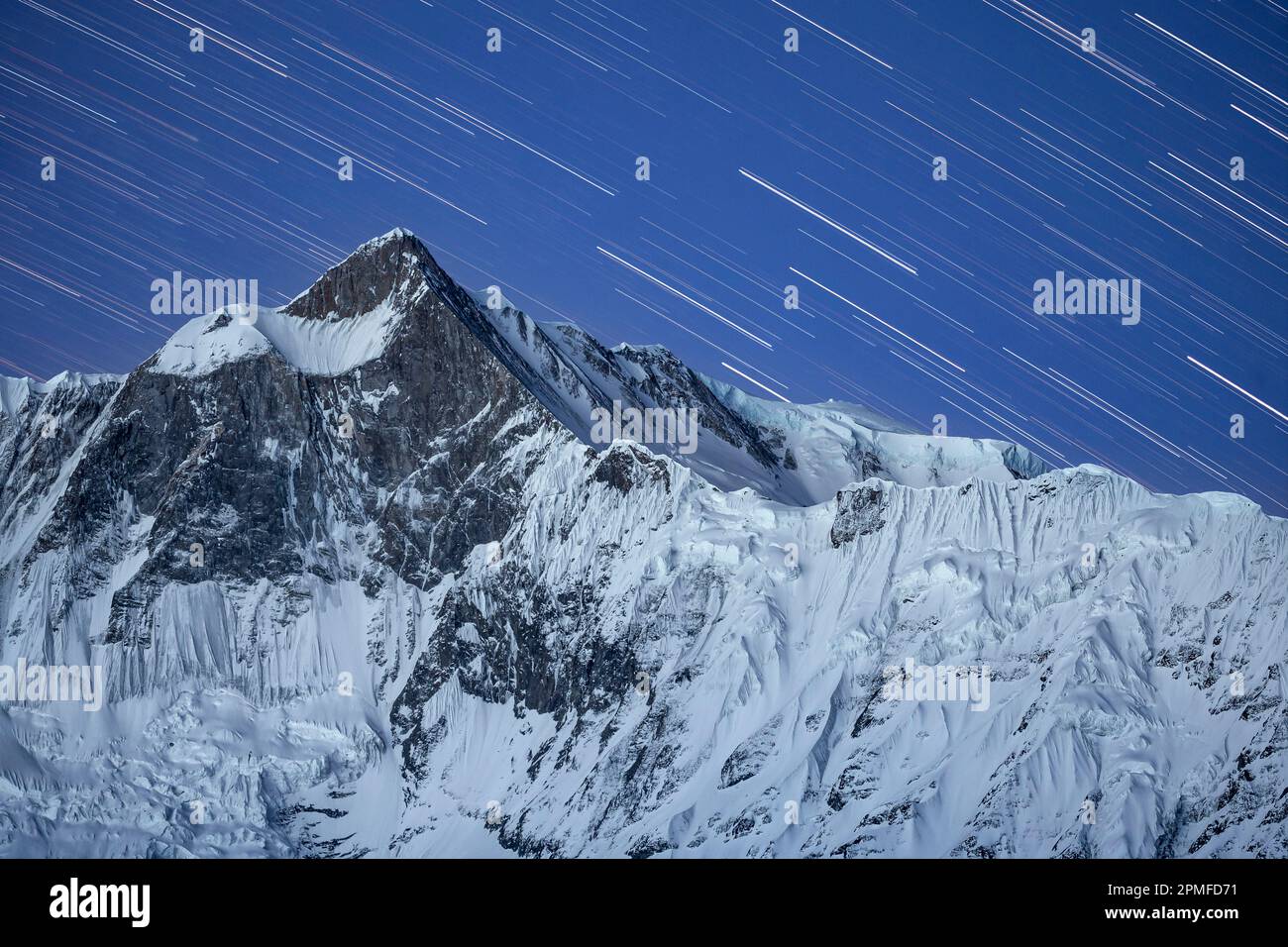 Nepal, Annapurna Conservation Area Project, night view and star trail ...