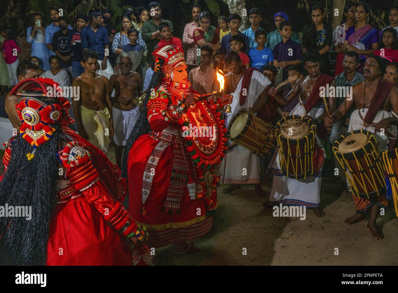 India, Kerala, Kannur, Teyyam ceremony is a religious ritual, a sacred ...