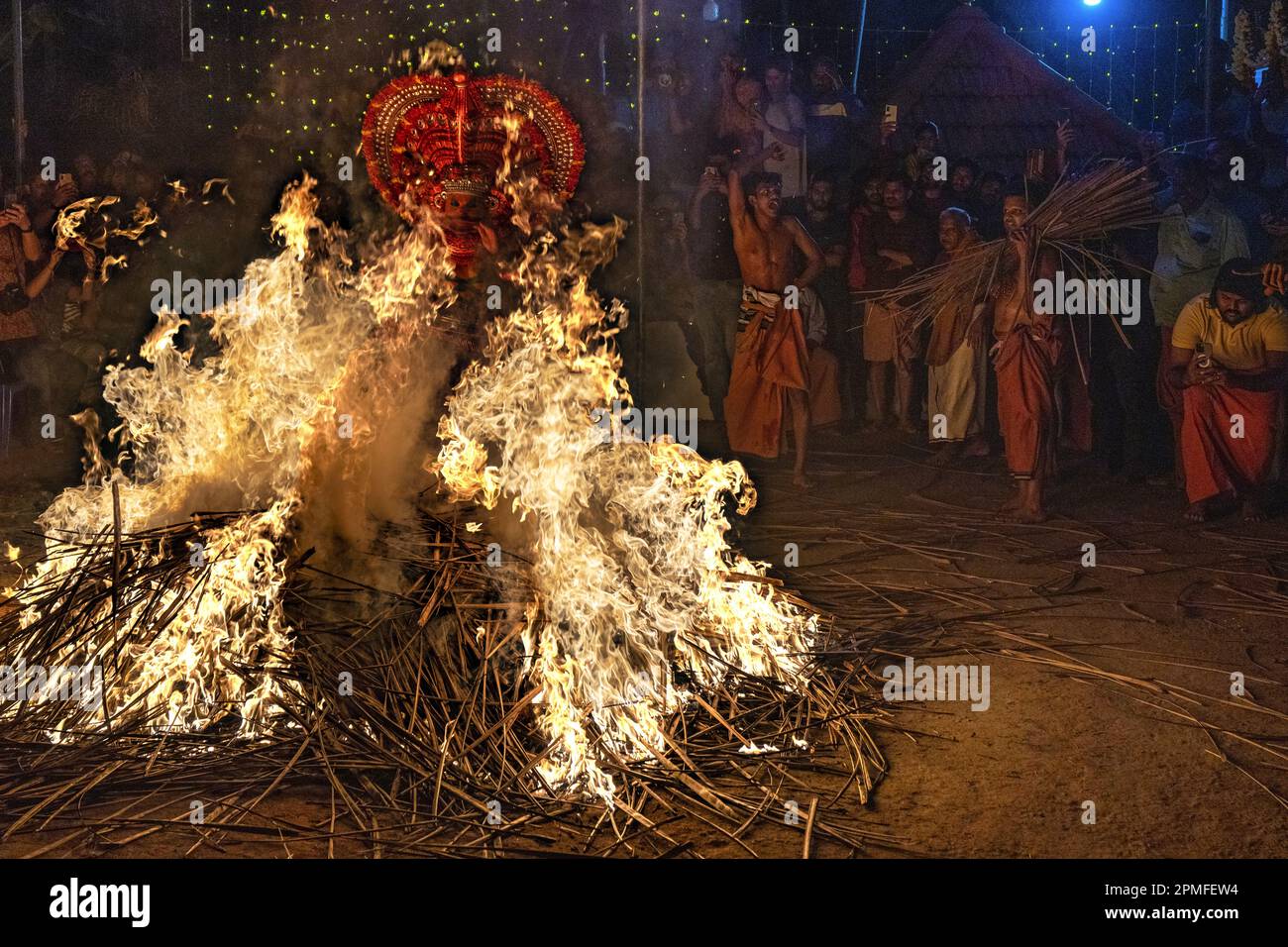 India, Kerala, Kannur, Teyyam ceremony is a religious ritual, a sacred ...