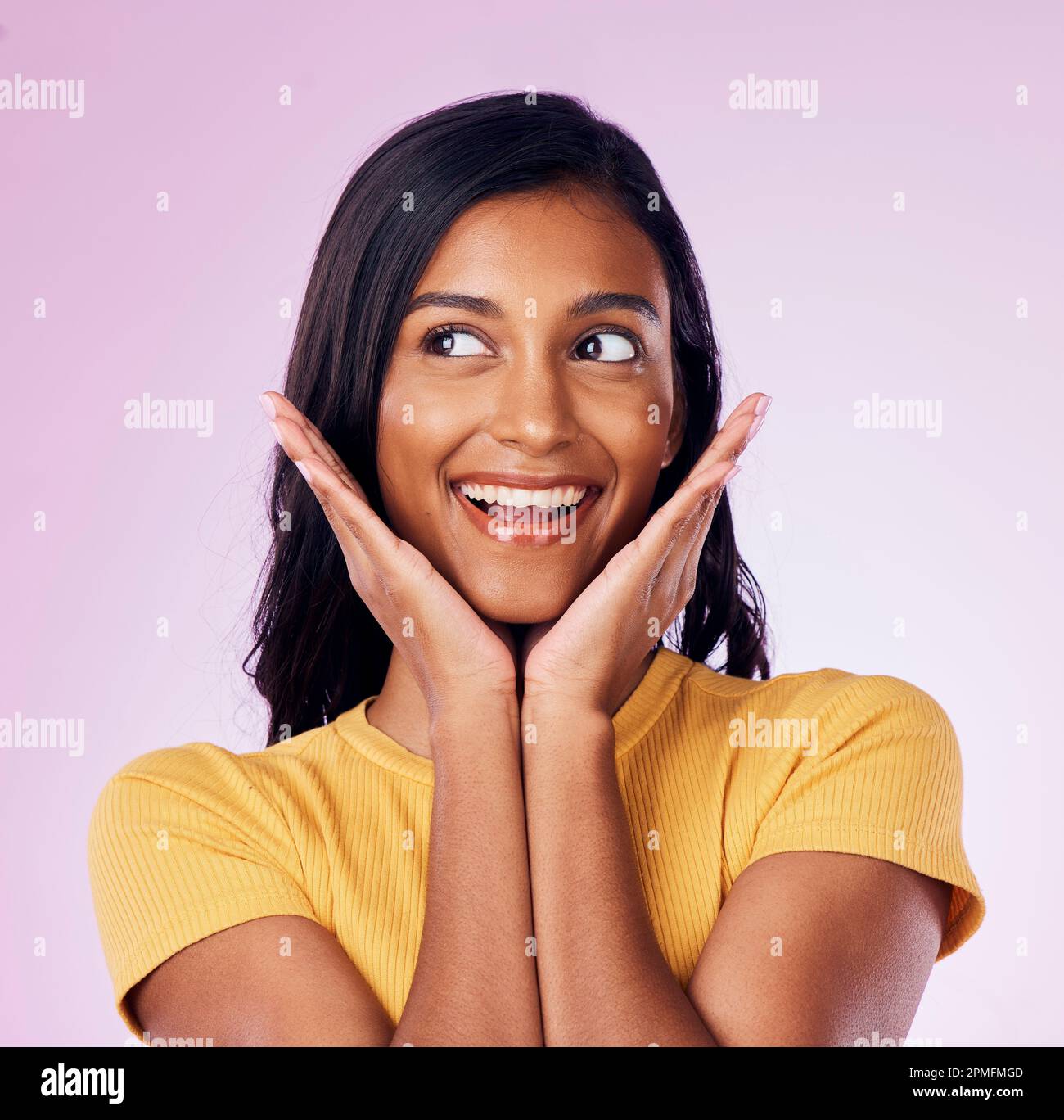 Excited, beauty and face of happy Indian woman on pink background with ...