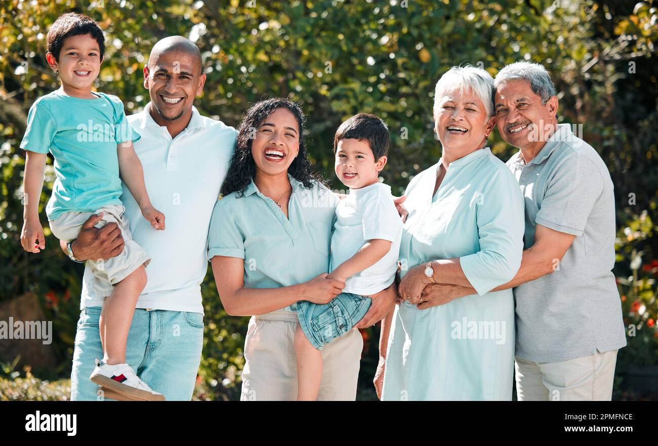 Parents, grandparents and children portrait outdoor as family in ...