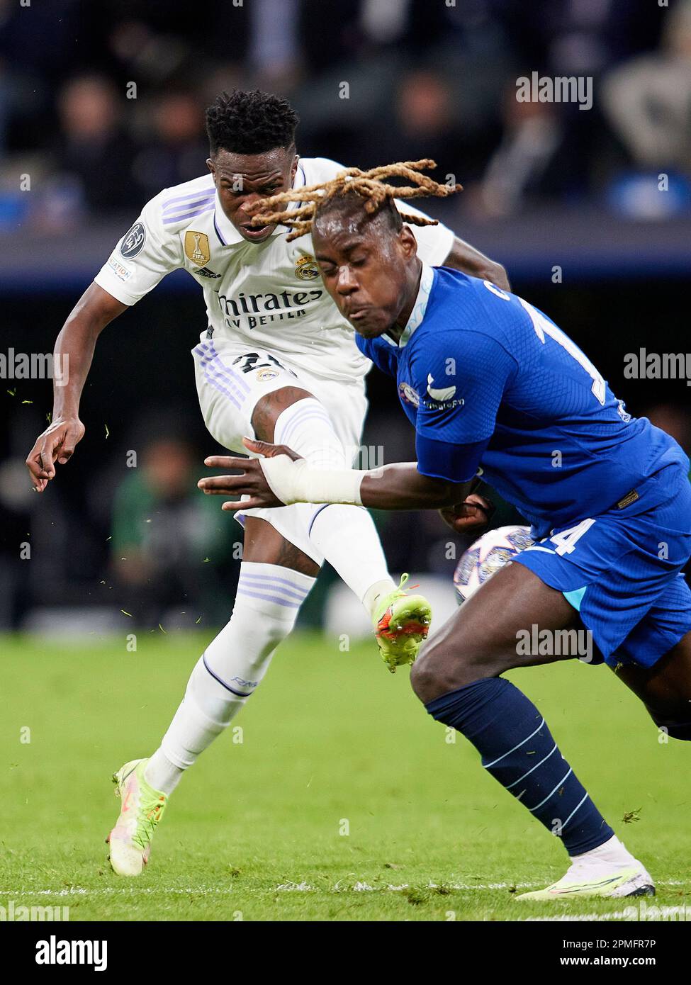 Madrid, Madrid, Spain. 12th Apr, 2023. Vinicius Jr. of Real Madrid and Trevoh Chalobah of ...