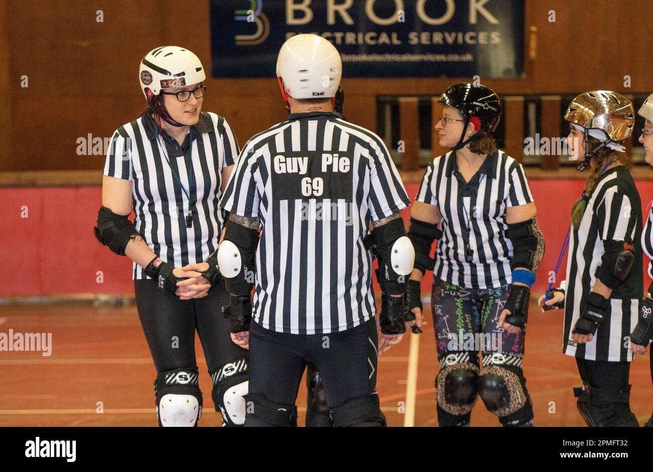 Roller derby referees at a mixed league scrimmage forgather in the ...