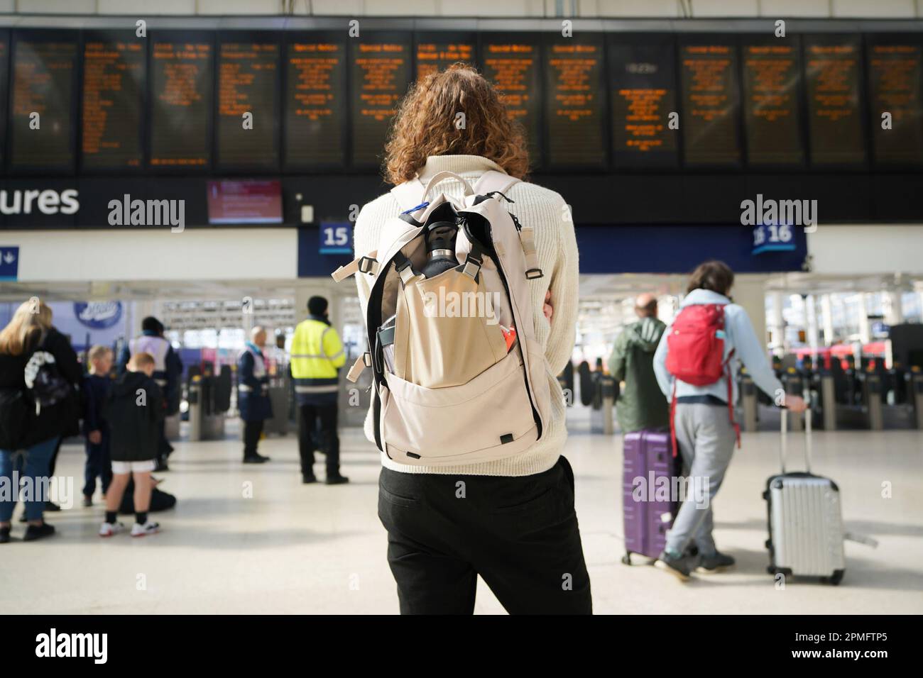 People in London Waterloo station, London. South Western Railway has ...