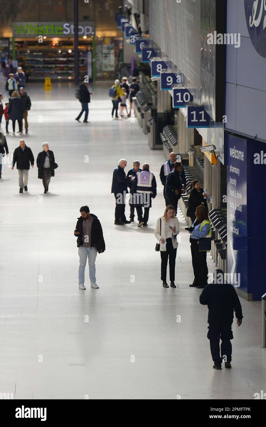 People in London Waterloo station, London. South Western Railway has ...