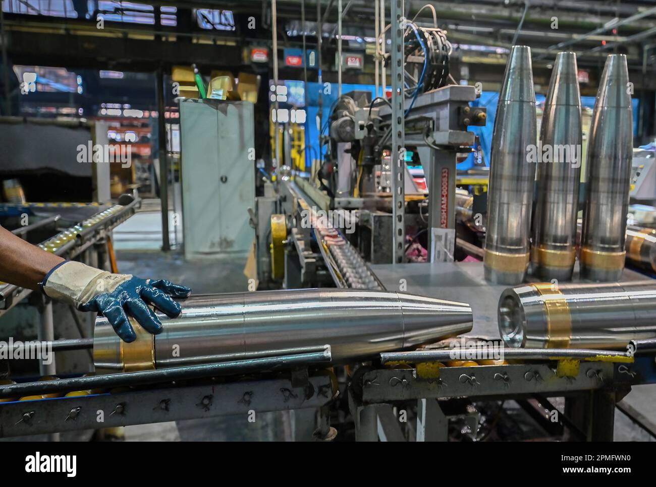 Scranton, United States. 12th Apr, 2023. A worker pushes a shell along ...